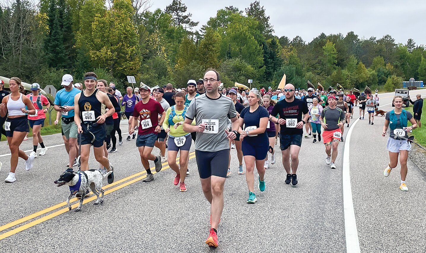 Records fall in portage races - The Timberjay